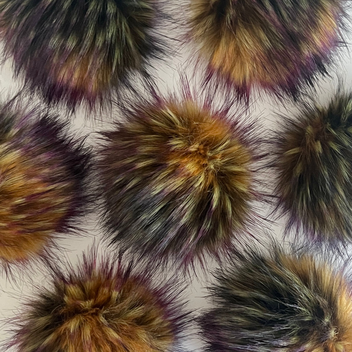 Aurora is the newest pom color in the shop – Three Birds Yarn Studio